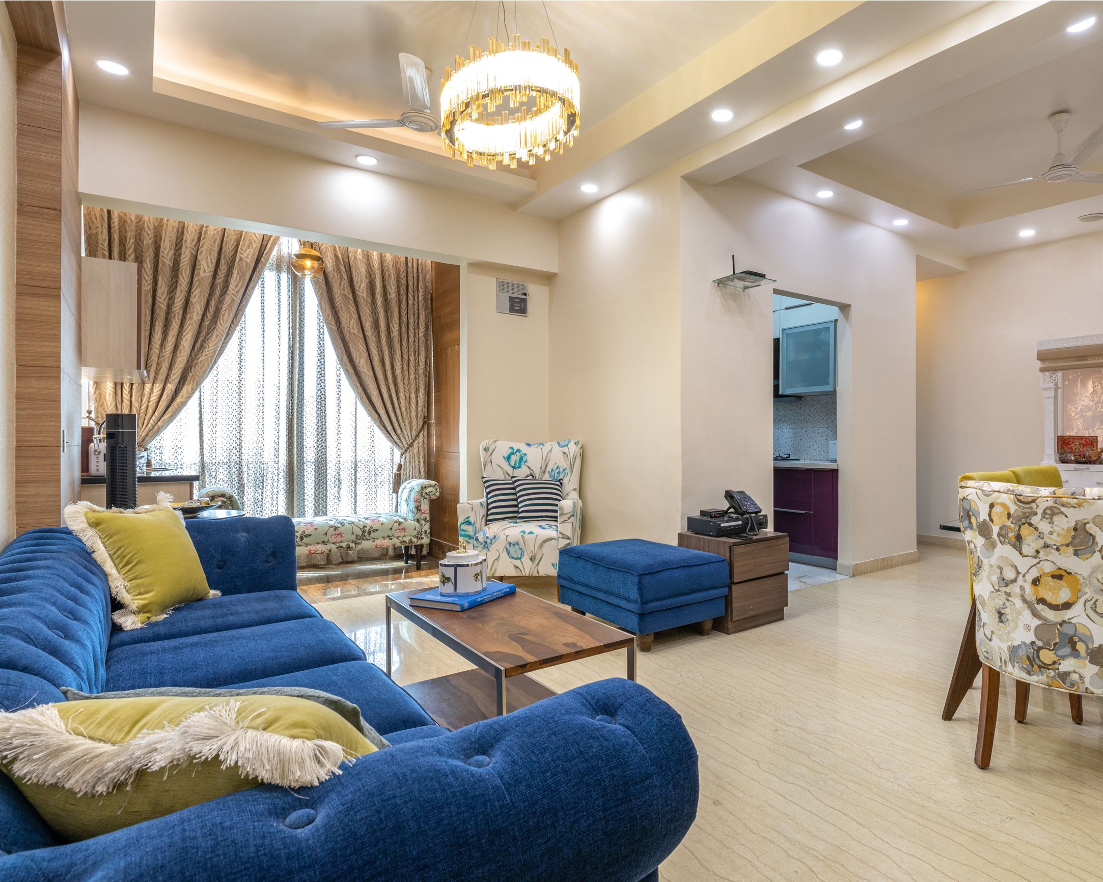 False Ceiling Design With Subtle Colours And Chandelier | Livspace