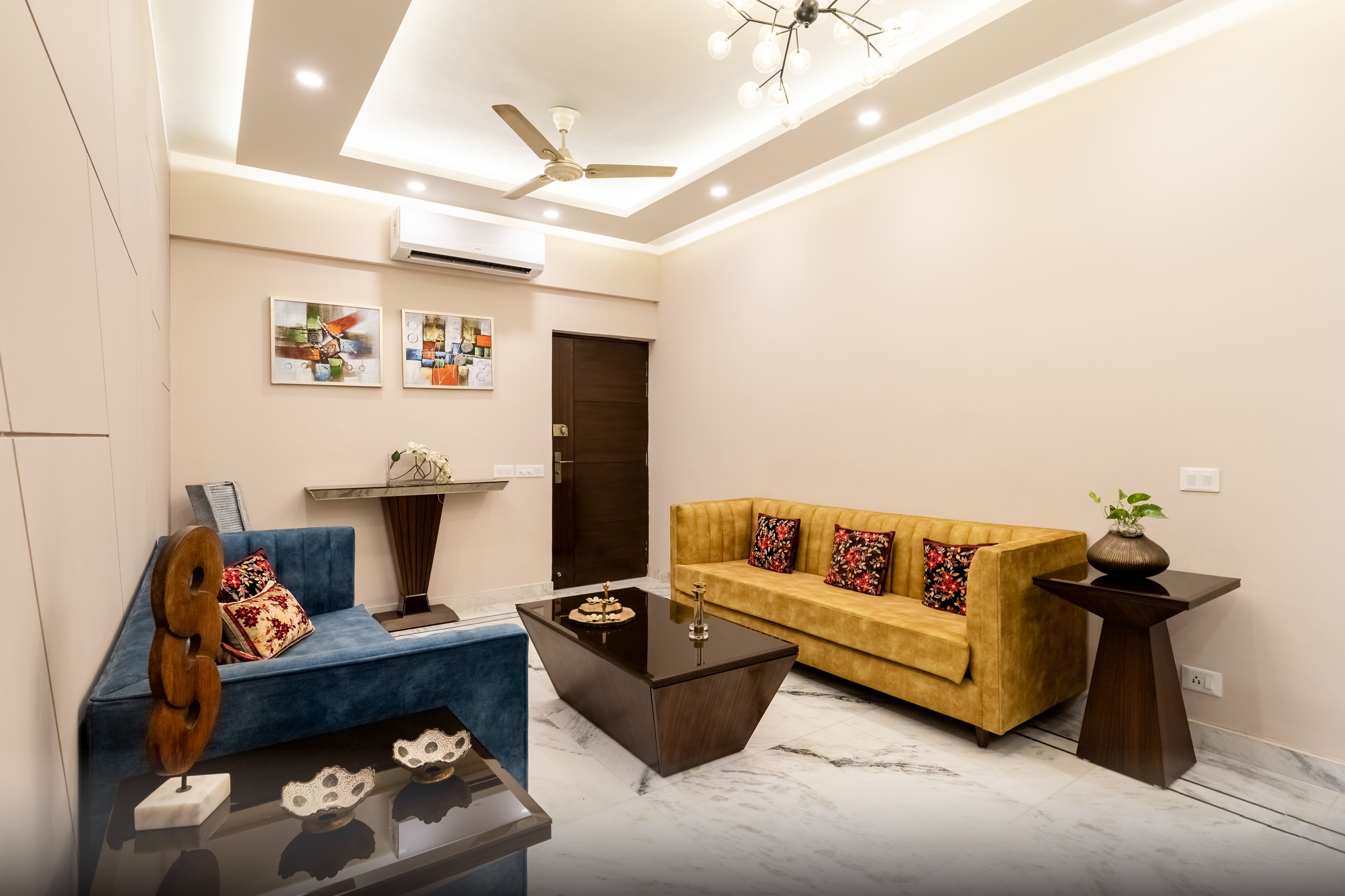 Peripheral Beige Drop False Ceiling With Cove Lights | Livspace