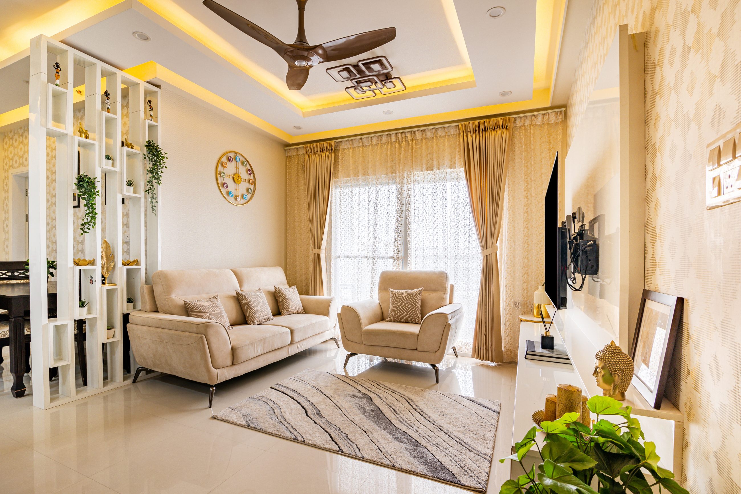 Peripheral Ceiling Design With Warm Strip Lighting | Livspace