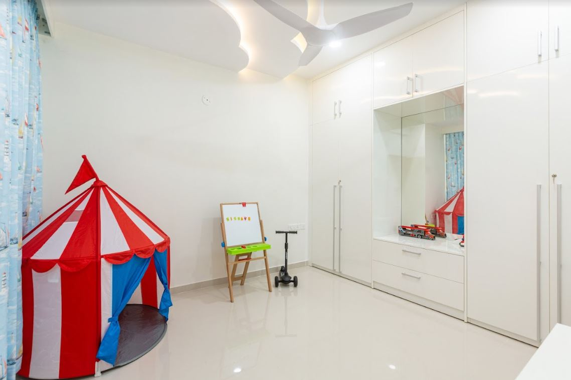 Compact Kids Room Design With White Wardrobe Design - 10x10 Ft | Livspace