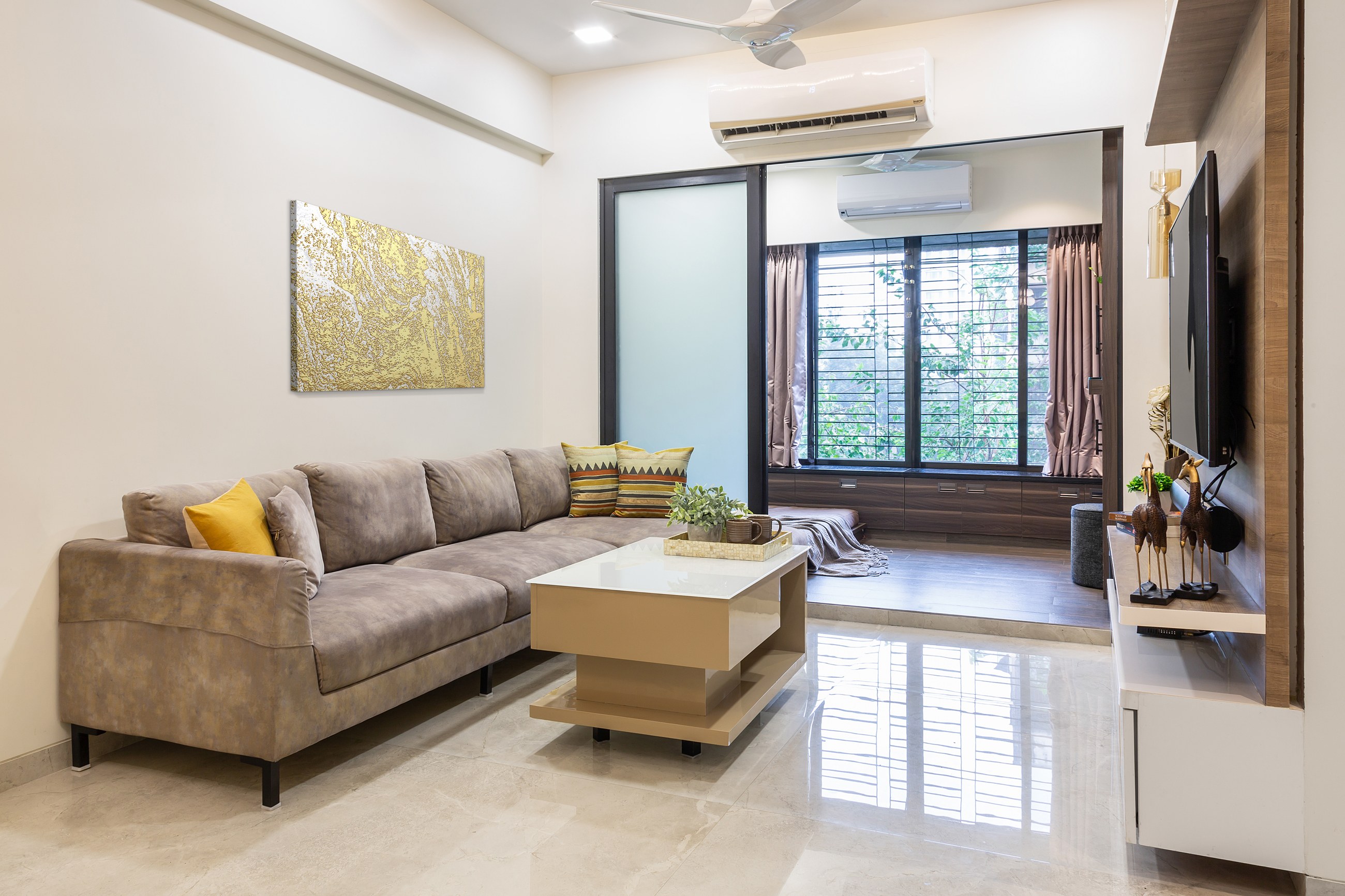Cream-Coloured Living Room Tile Design With A Glossy Finish | Livspace