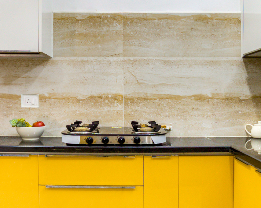 Warm-Toned Kitchen Tile Design With A Patterned Dado | Livspace