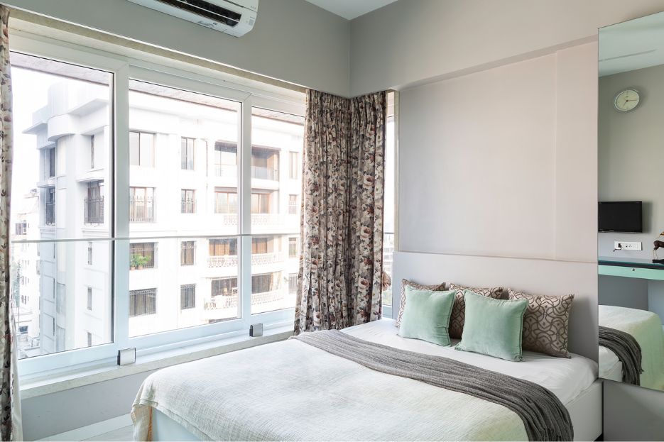 Full-Length Window Design With Floral Curtains | Livspace