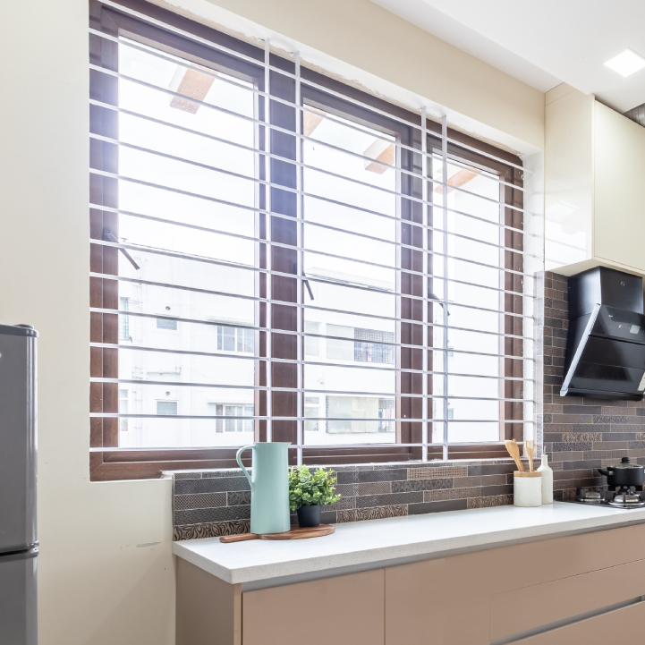 Kitchen Window Design With White Grills | Livspace
