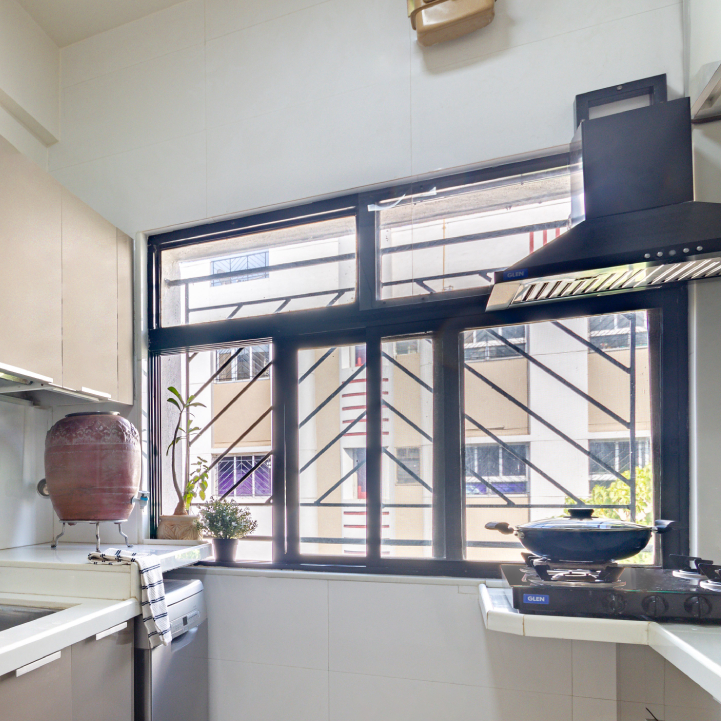 Kitchen Window Design With Fixed Glass And Sliding Shutters | Livspace