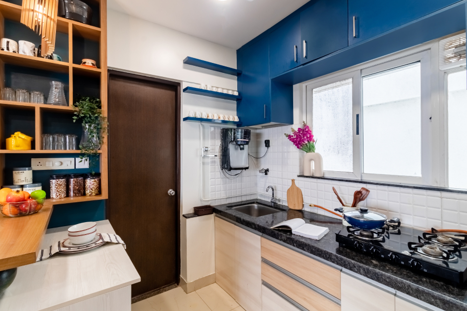 Kitchen Window Design With An Exhaust Fan Opening | Livspace