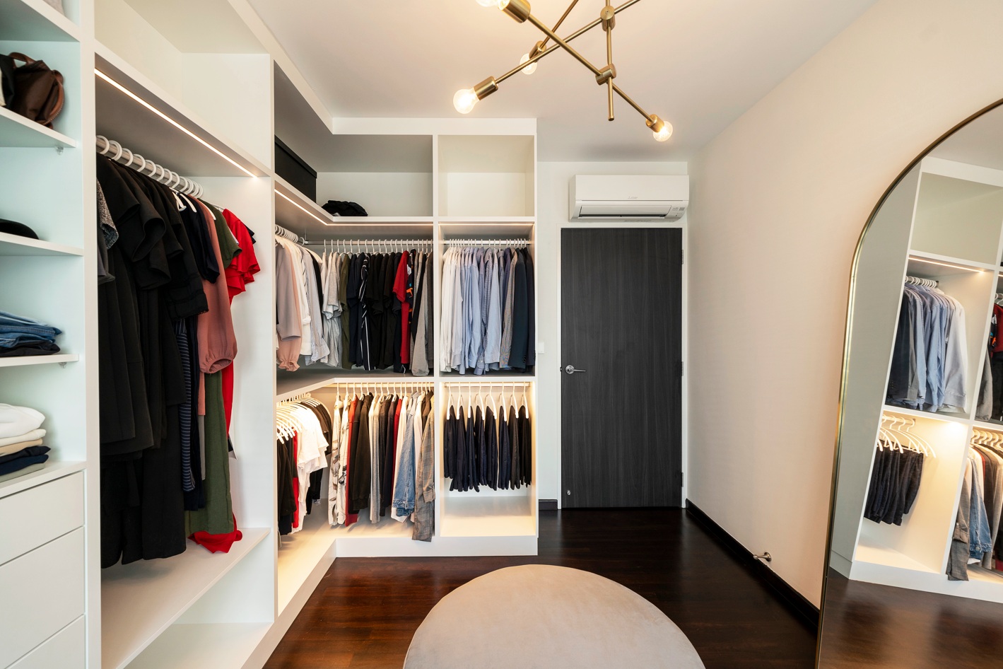 L-Shaped Dressing Room Wardrobe Design With Profile Lights | Livspace