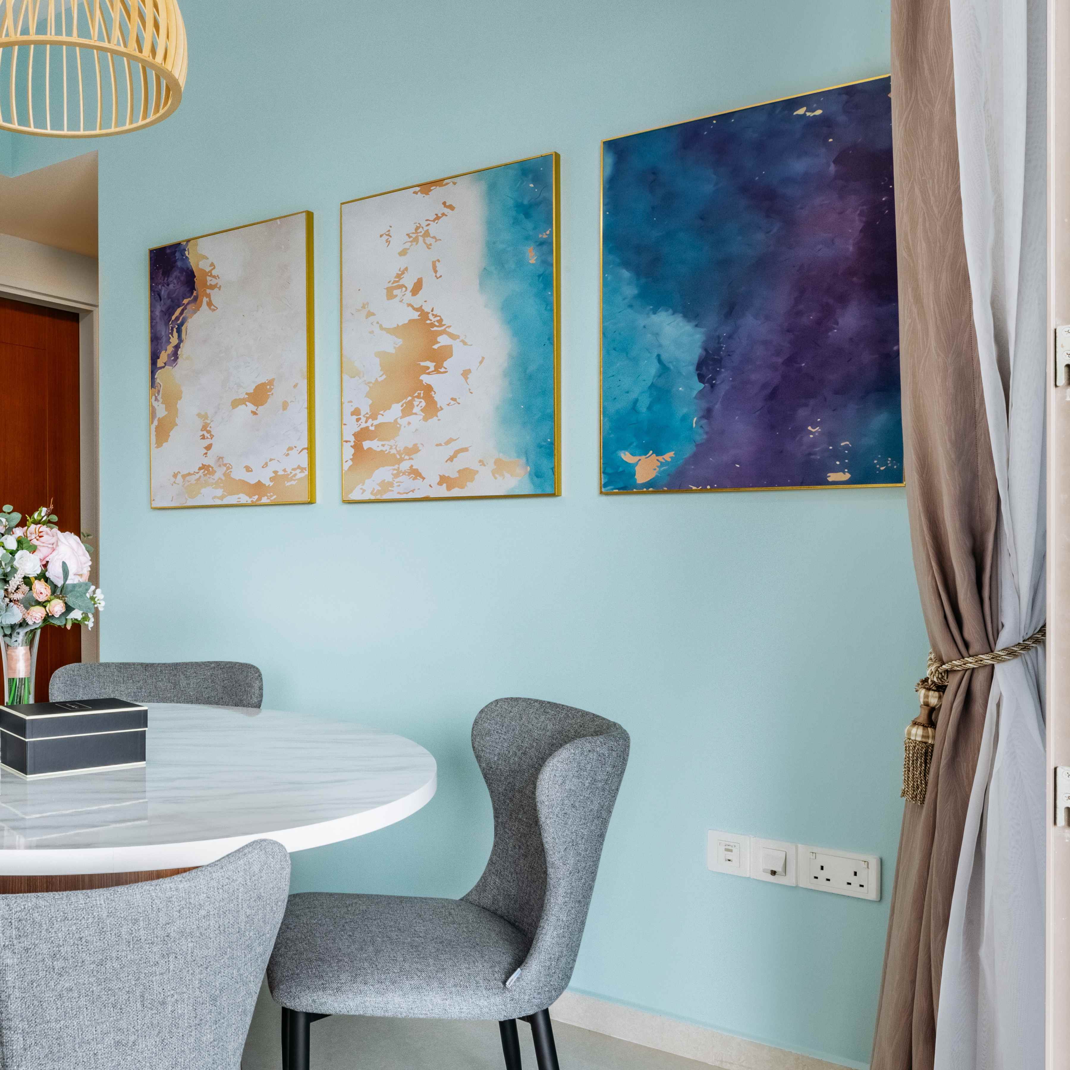Blue Wall Design With Picture Frames | Livspace