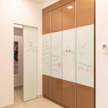 Sleek Wardrobe Interior Design With Sliding Doors | Livspace