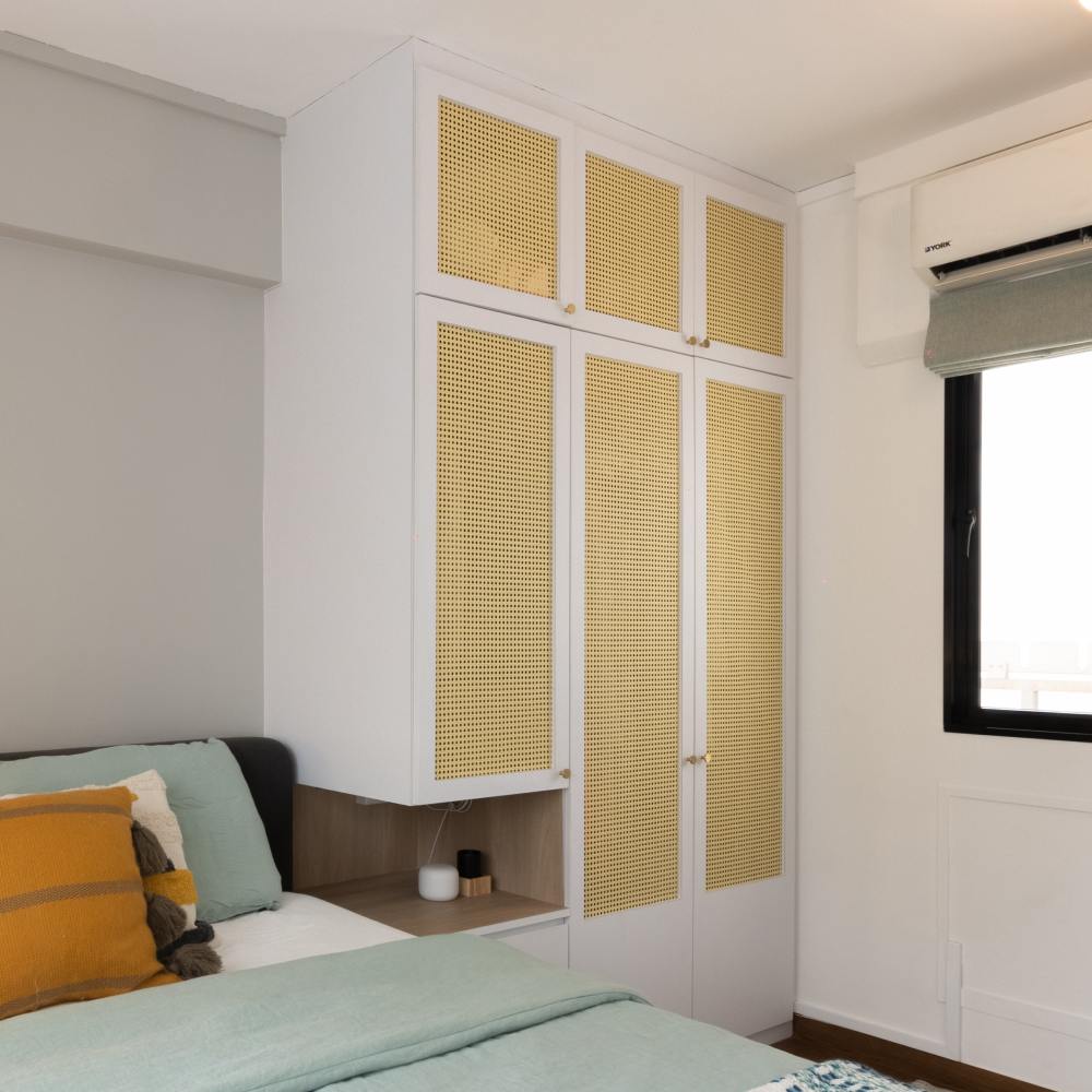 Compact Wardrobe Design With Rattan Shutters | Livspace