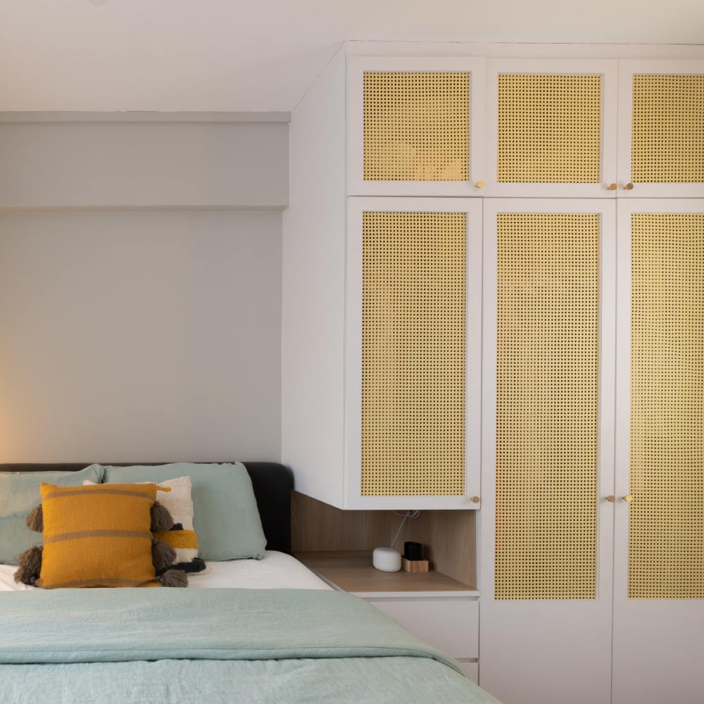 Compact Wardrobe Design With Rattan Shutters | Livspace
