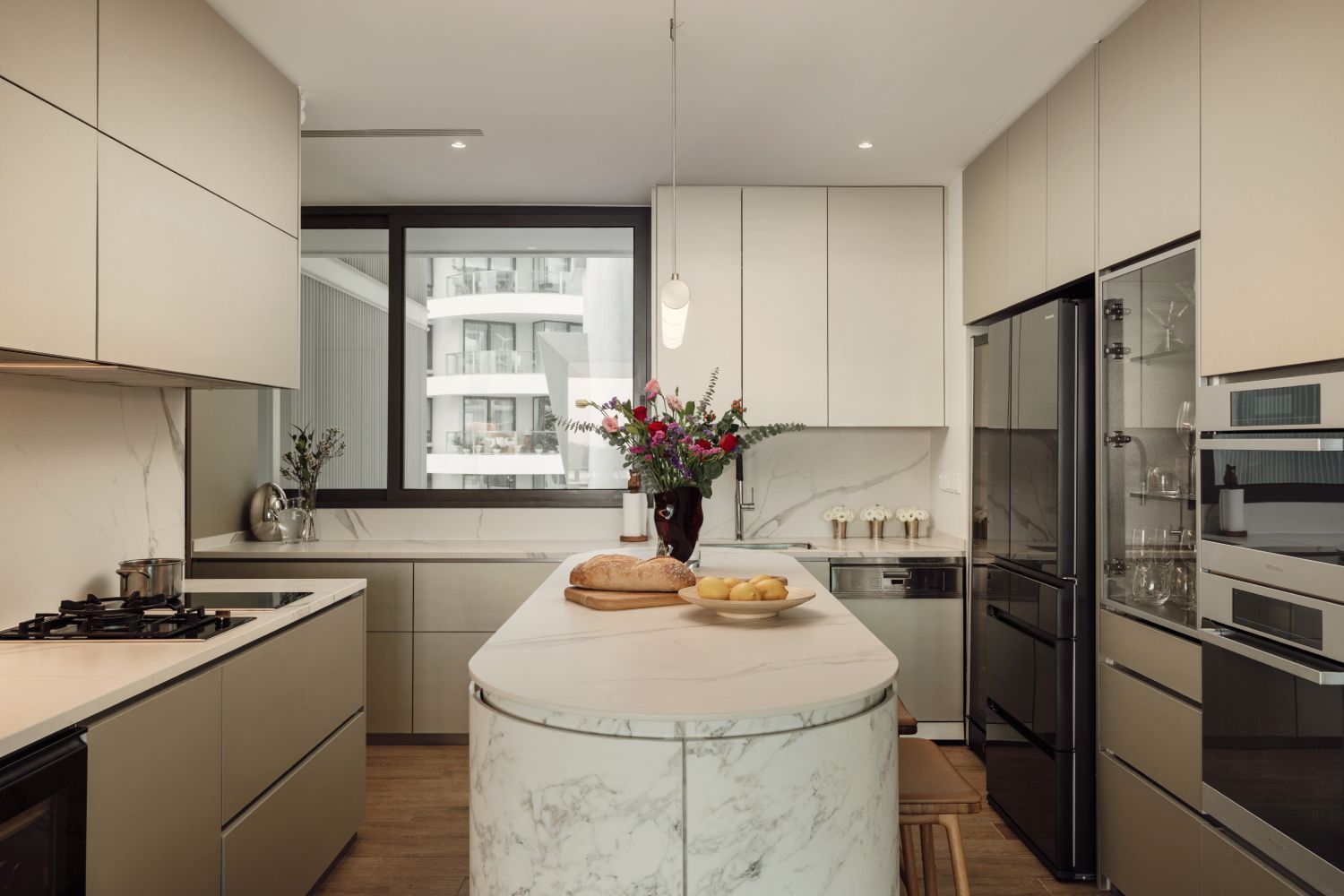 Spacious Kitchen Island Design With Marble Island | Livspace
