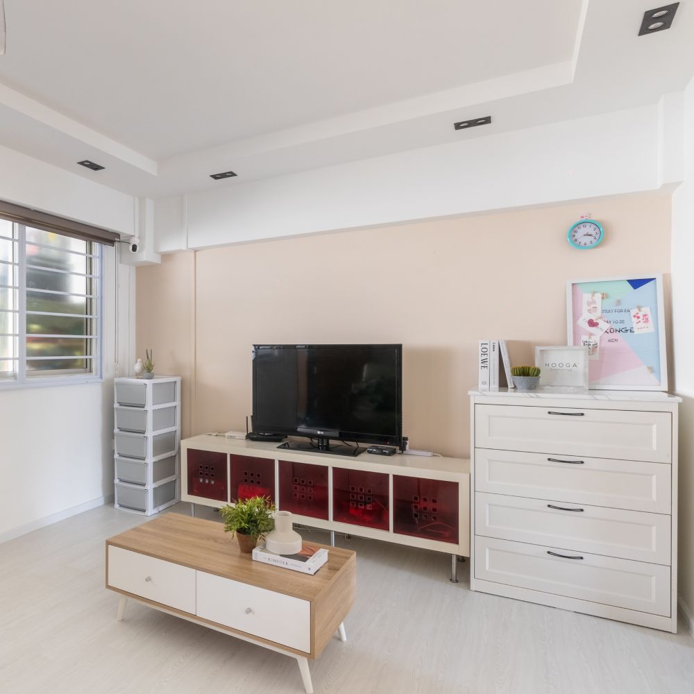 Semi-Glossy Beige And Red Floor-Mounted TV Unit Design | Livspace