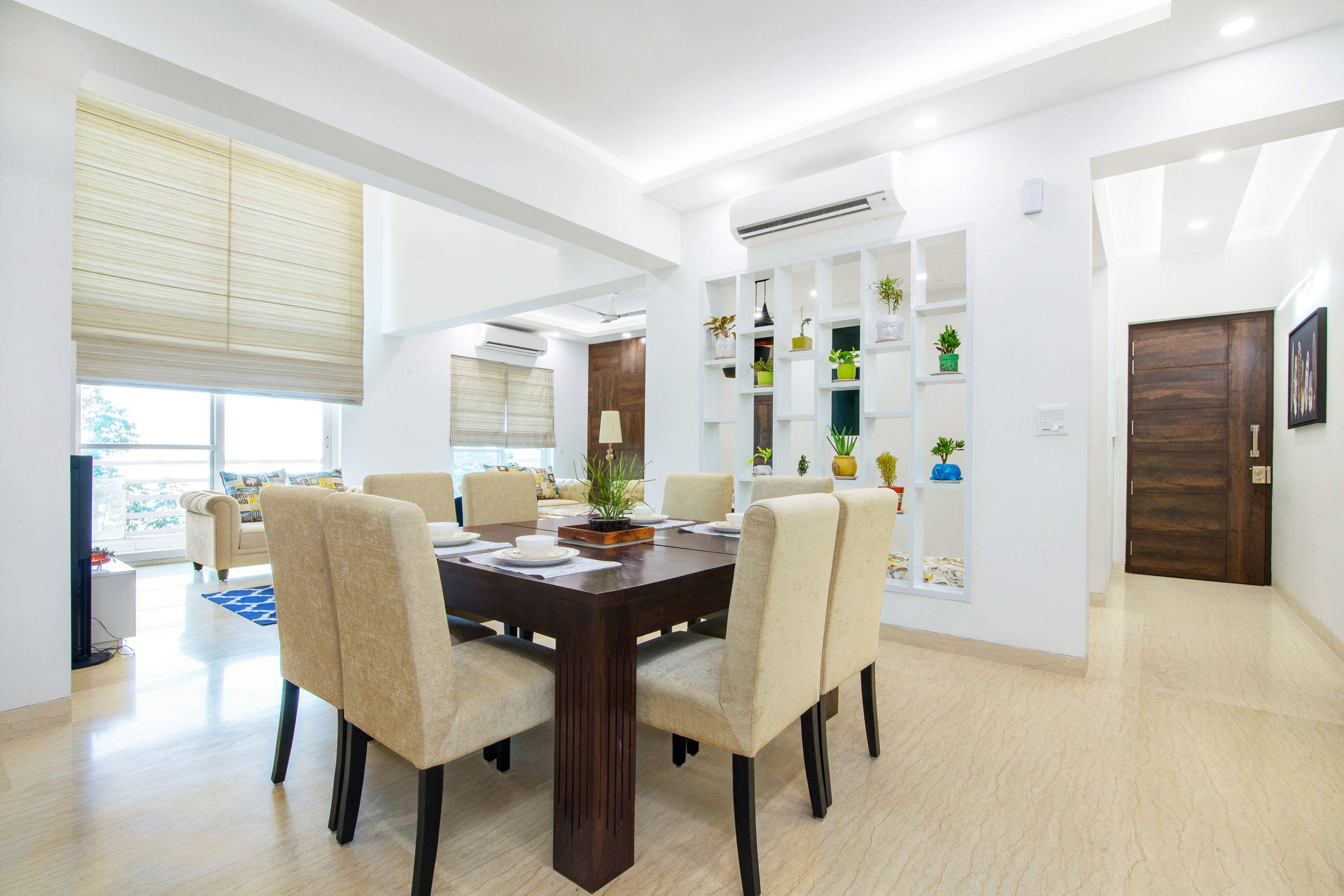 8-Seater Dining Hall Design with A Neutral Colour Palette | Livspace