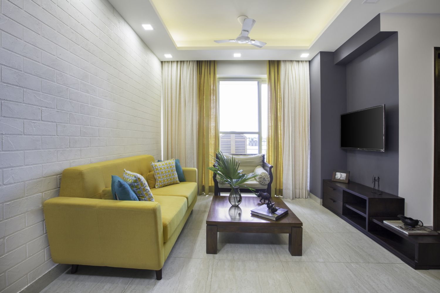 Noida Flat Interior Design with Inviting Wooden Balcony, Vibrant Living ...