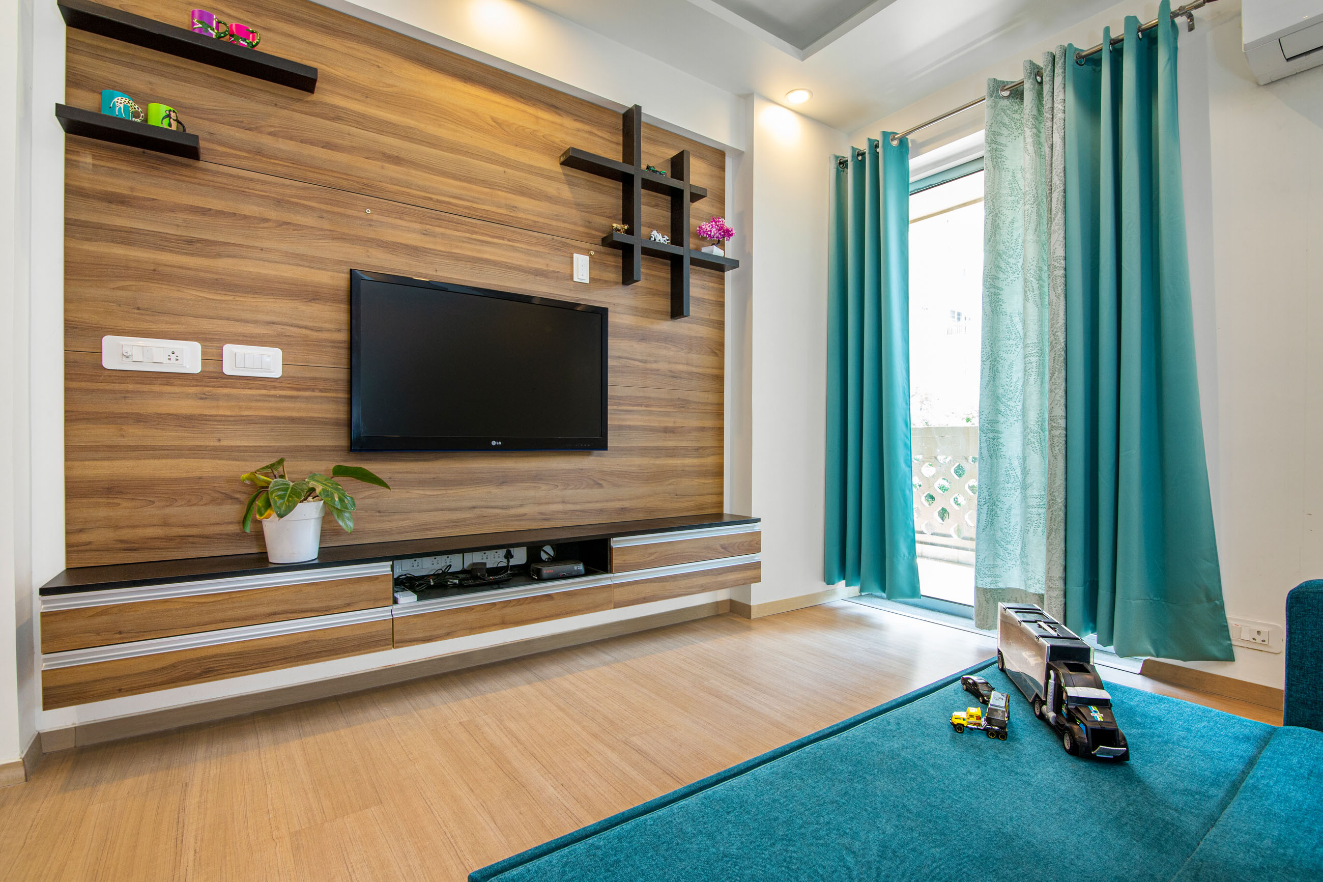 Floating Black And Wood Modern TV Unit Design With Shelves | Livspace