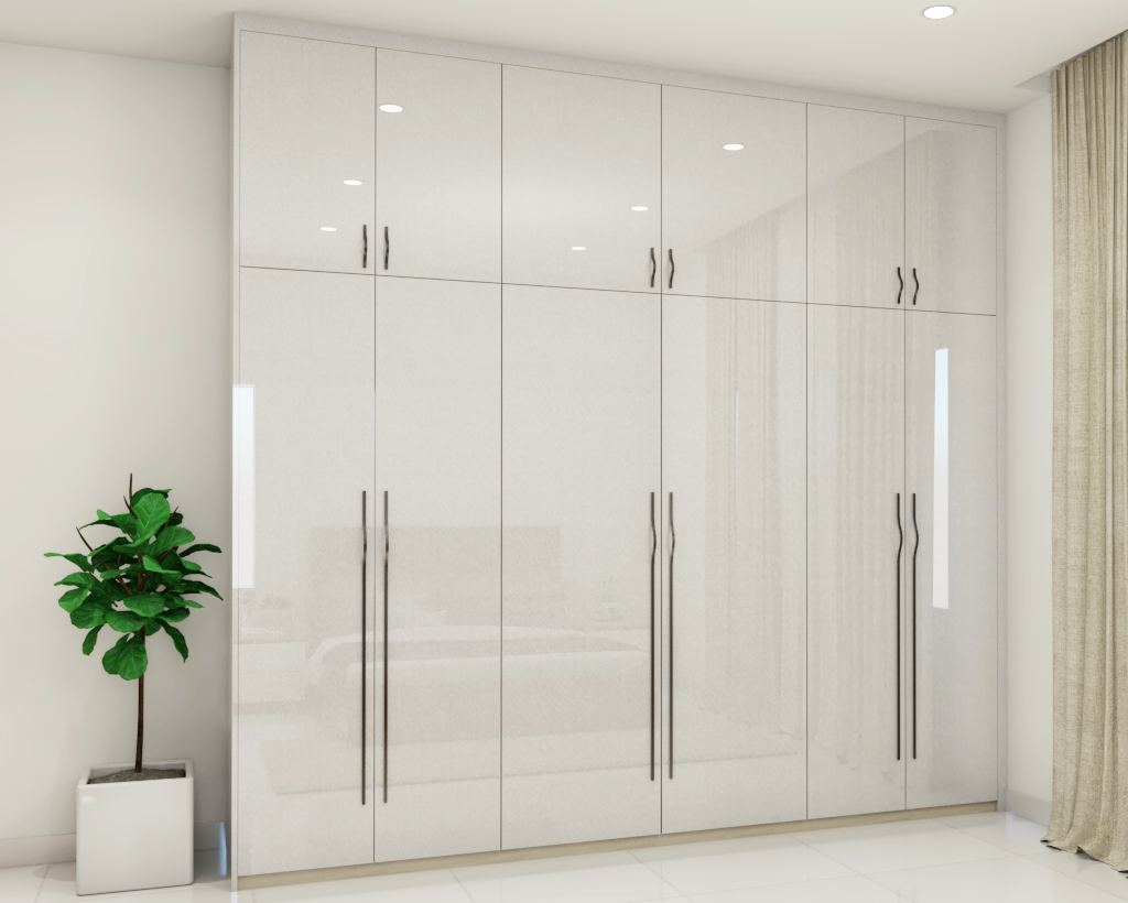 Modern Wardrobe with Stylish Handles and Glossy Surface | Livspace