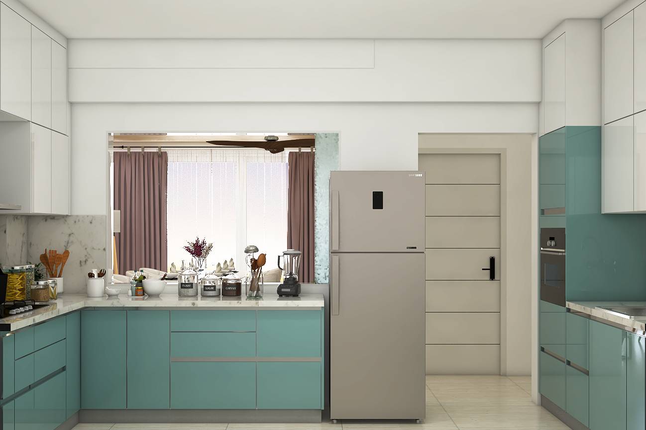 Spacious Kitchen Design With Blue Coloured And White Cabinets | Livspace