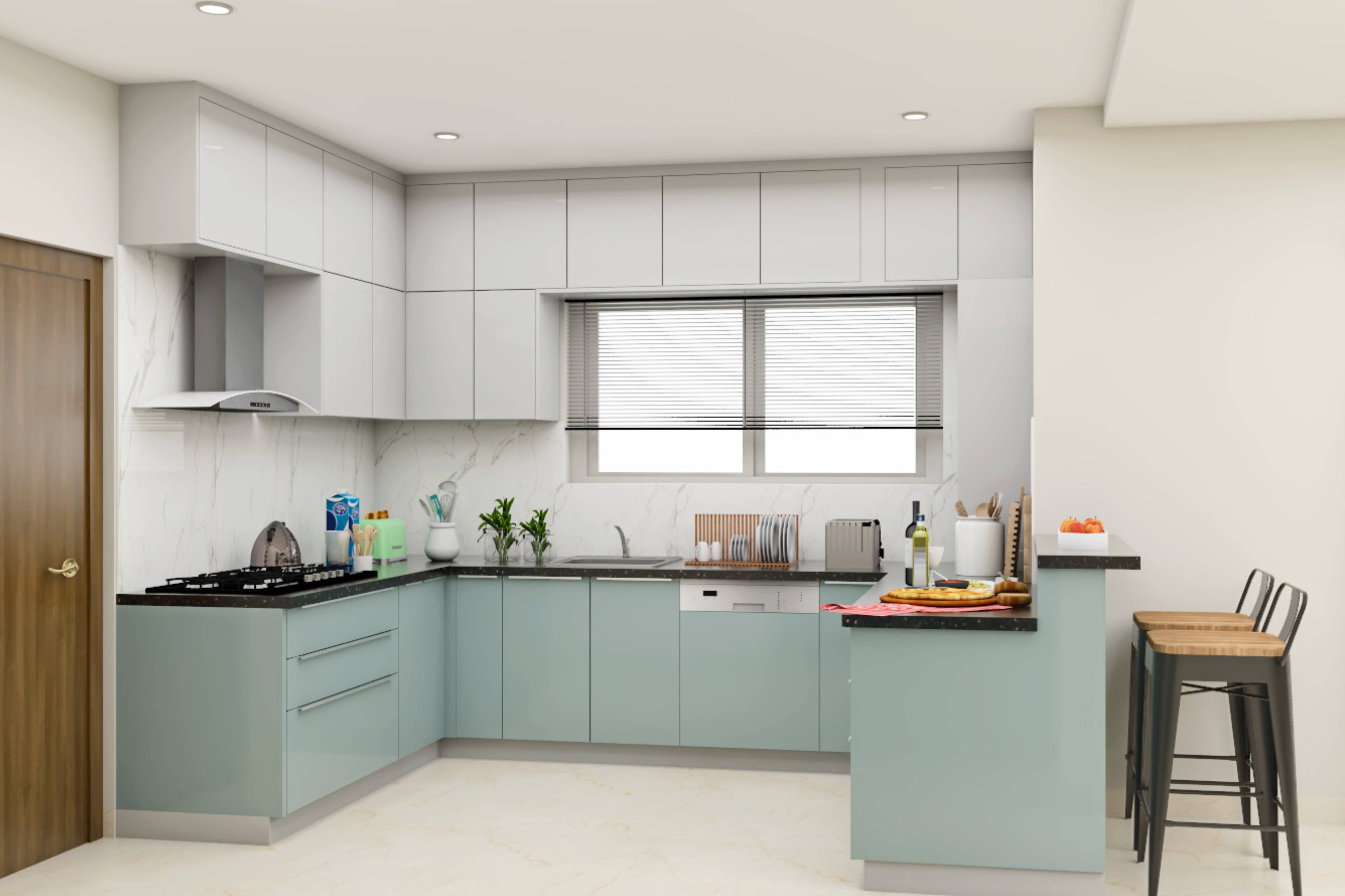 Spacious Kitchen Design With Breakfast Counter And Pale Blue Cabinets ...