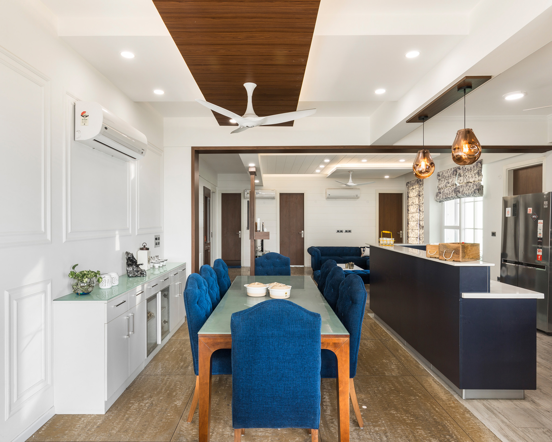 Wooden Dining Room Design With Blue Velvet Upholstered Chairs And White ...