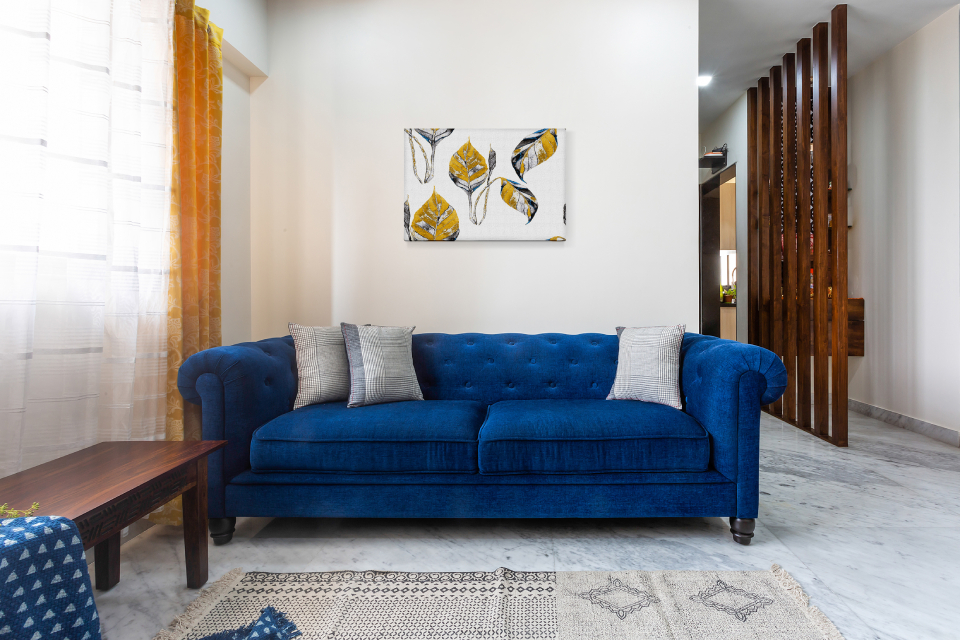 Compact Drawing Room Design With Wooden Centre Table | Livspace