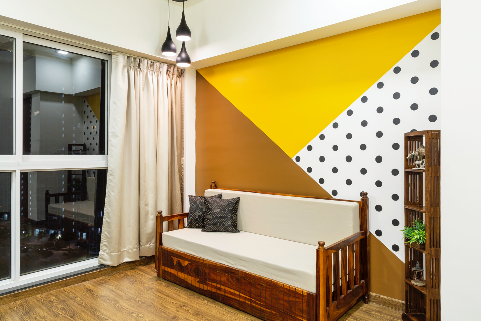 Compact Drawing Room Design With An Eclectic Wall | Livspace