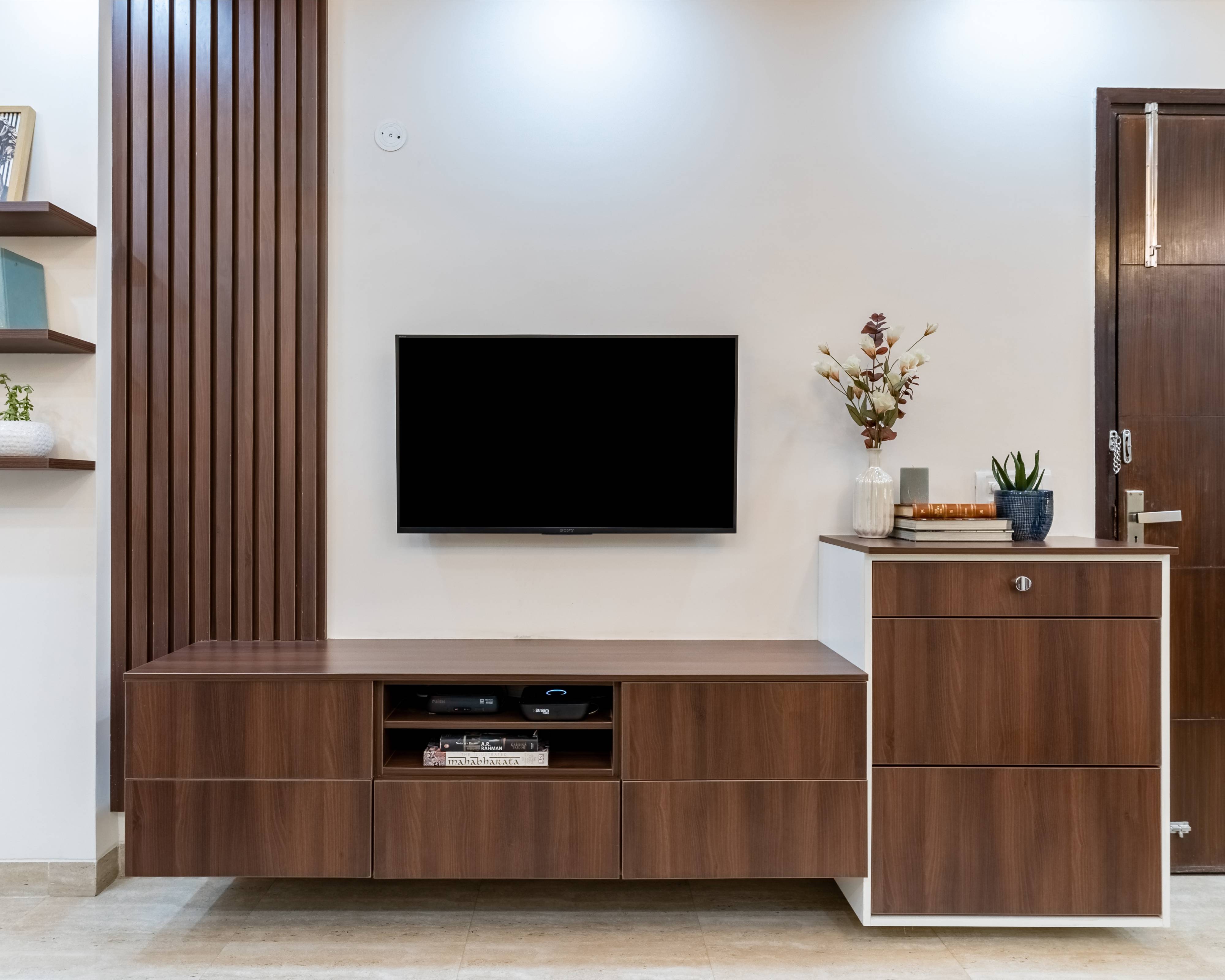 TV Cabinet With Wooden Planks For The Back Wall | Livspace