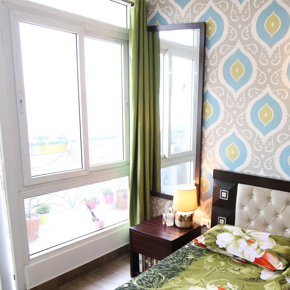 Low-Maintenance White Sliding Window Design | Livspace