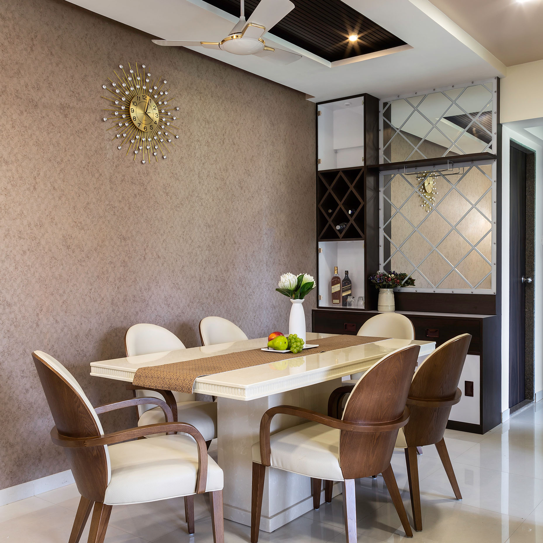 6-Seater Dining Room Design With Textured Brown Wallpaper And Crockery ...