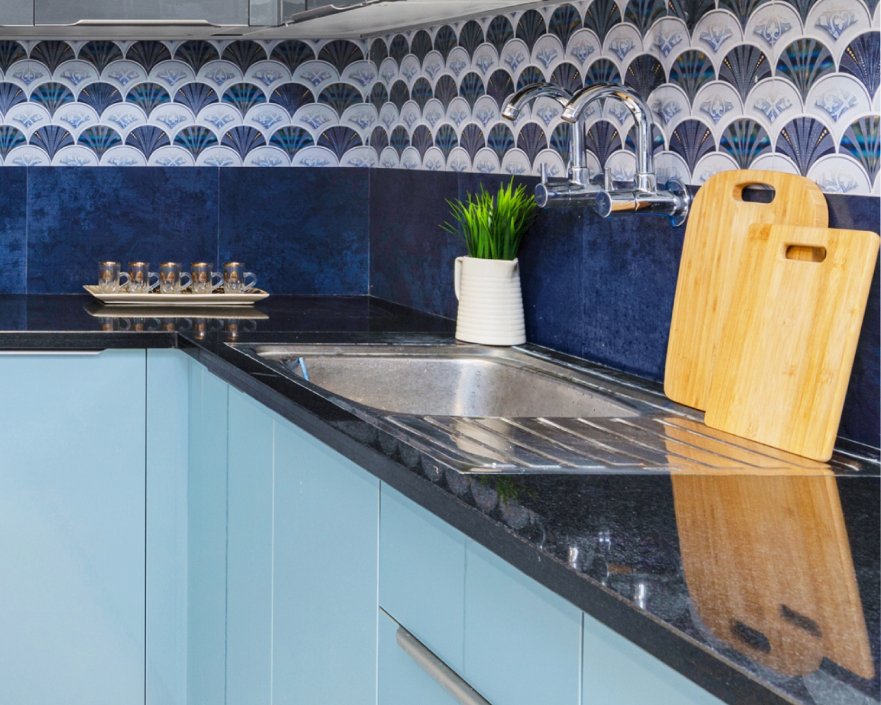 Stainless Steel Top Mount Kitchen Sink With Fishscale Dado Tiles | Livspace