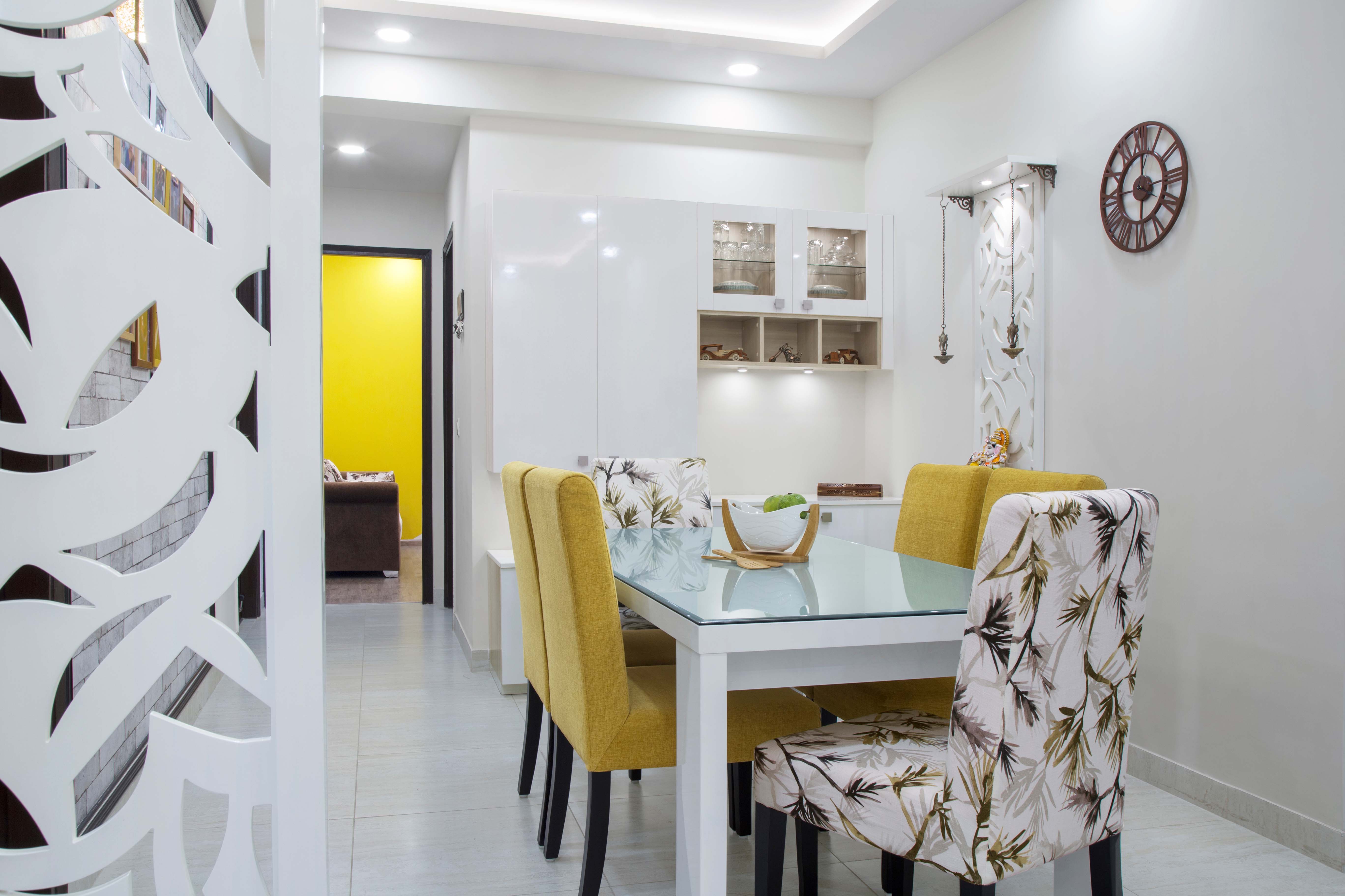 2-BHK Flat Design In Noida With L Shaped Magenta Sofa Set And Accent Seaters | Livspace