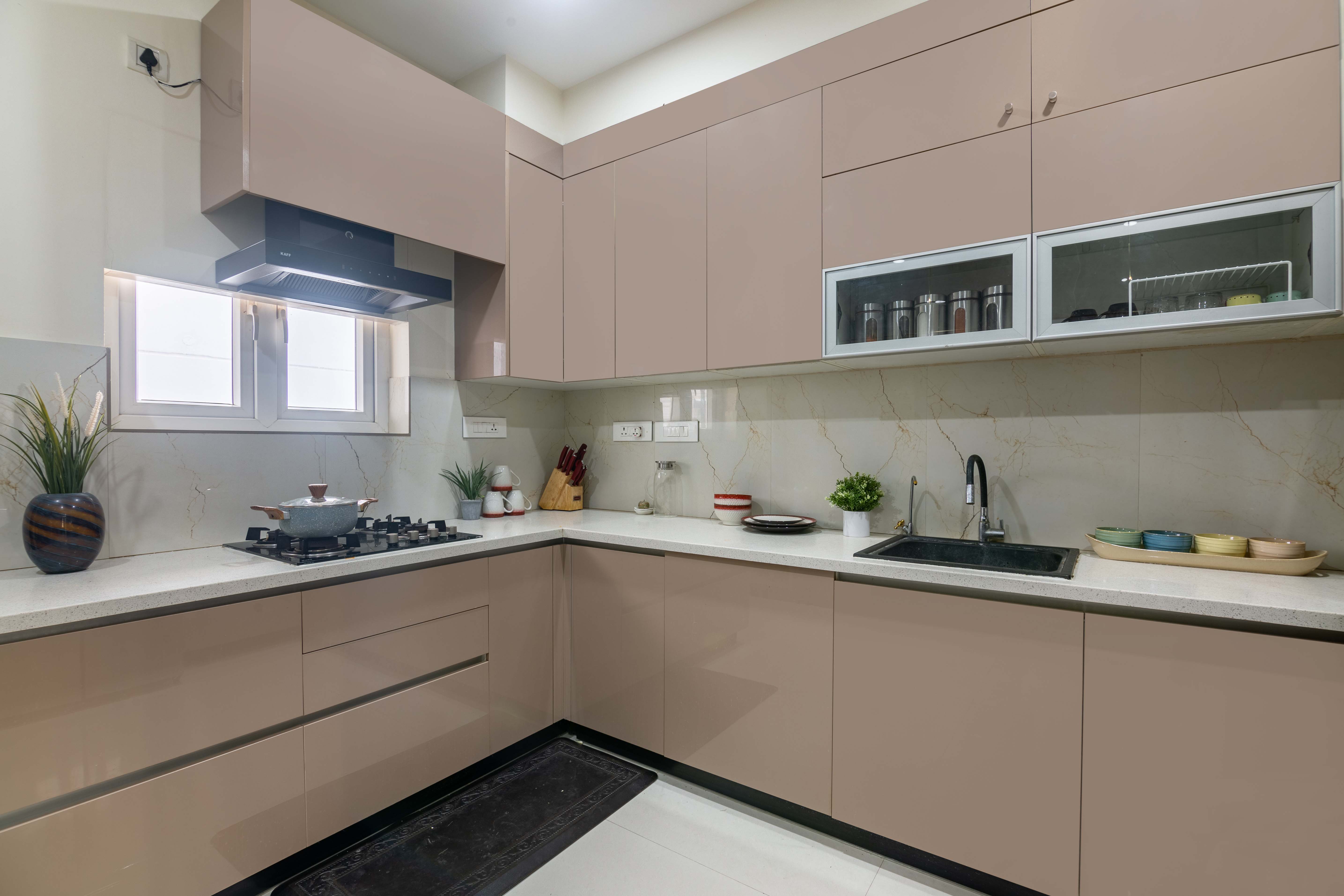 Light Beige L-Shaped Kitchen Design With Quartz Countertop | Livspace