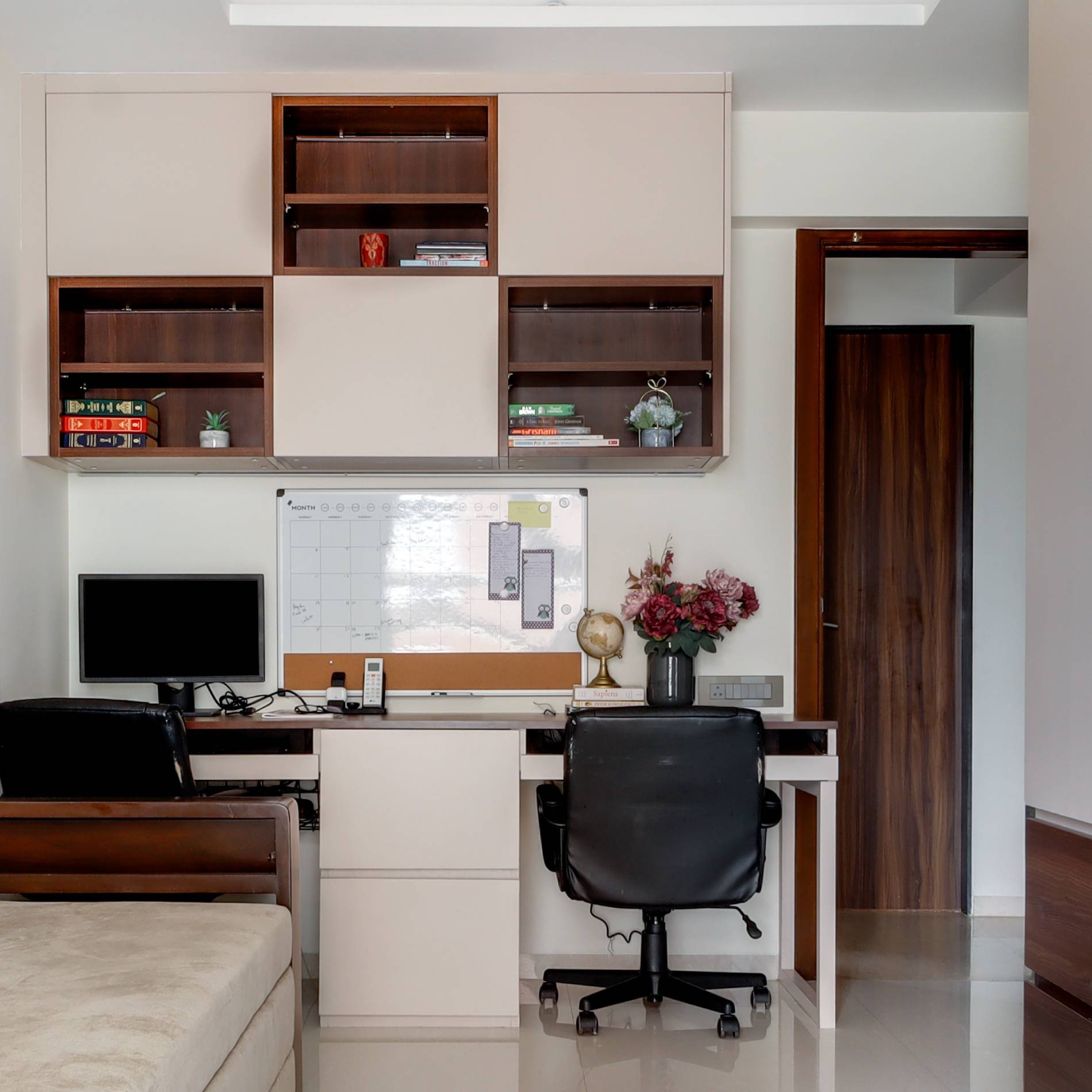 Spacious Home Office Design With A Height-Adjustable Chair | Livspace