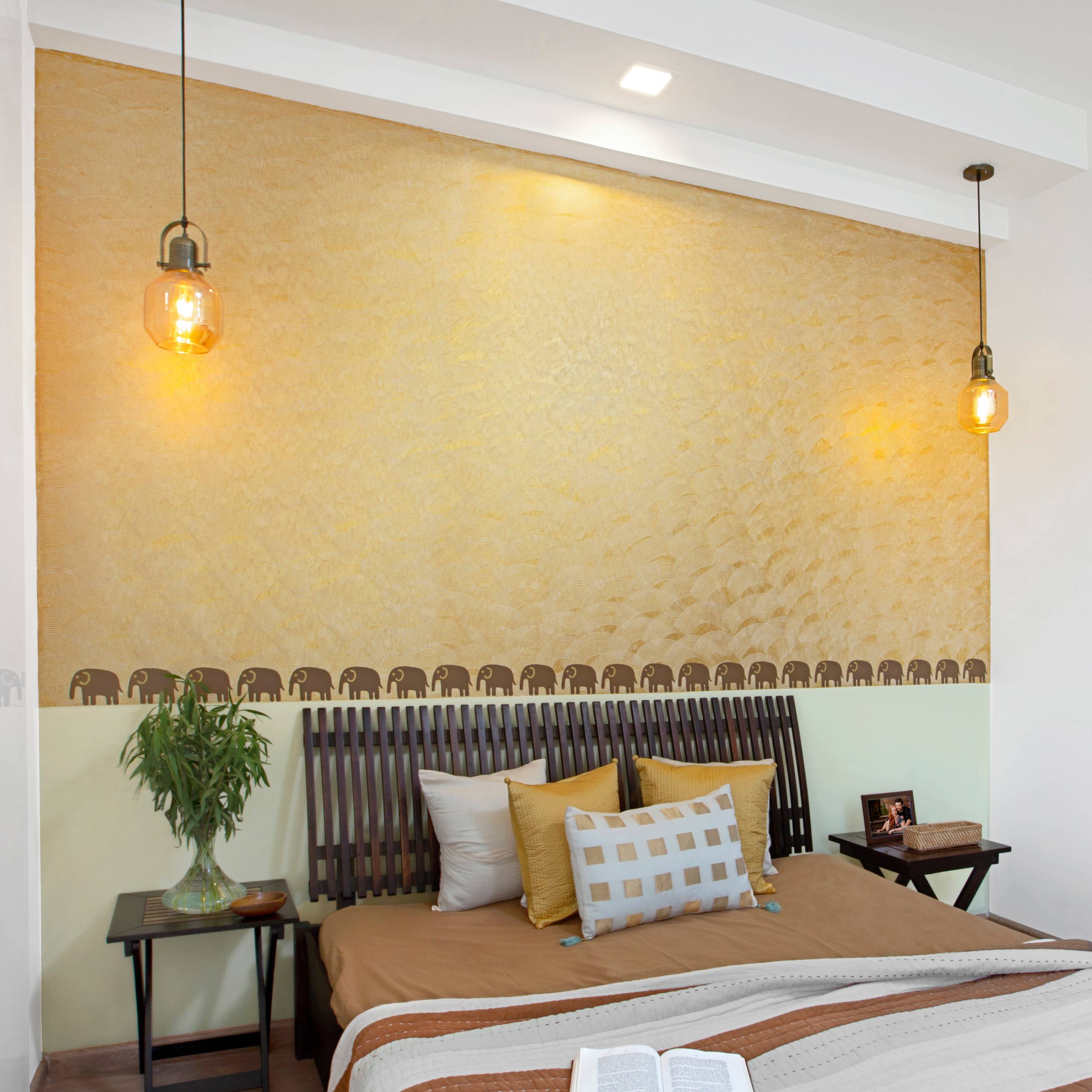 Bright Yellow Accent Wallpaper Design With An Elephant-Patterned Border ...